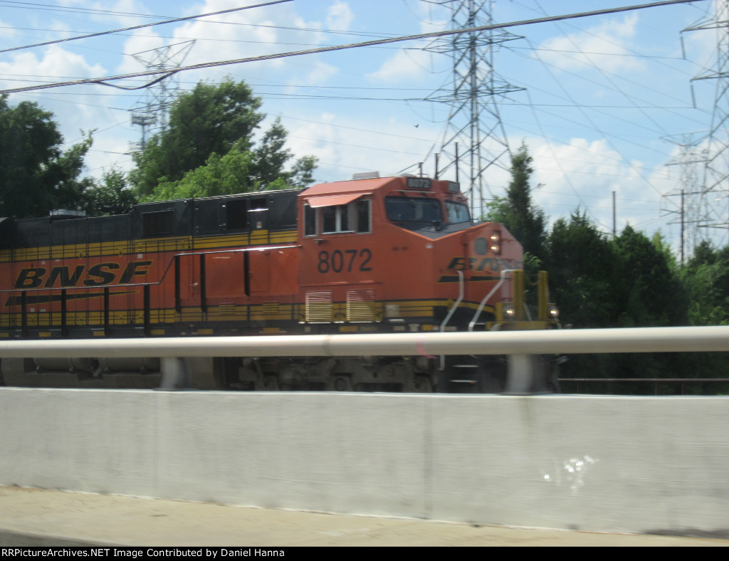 BNSF 8072 leads NS 16A past the White Siding in Memphis